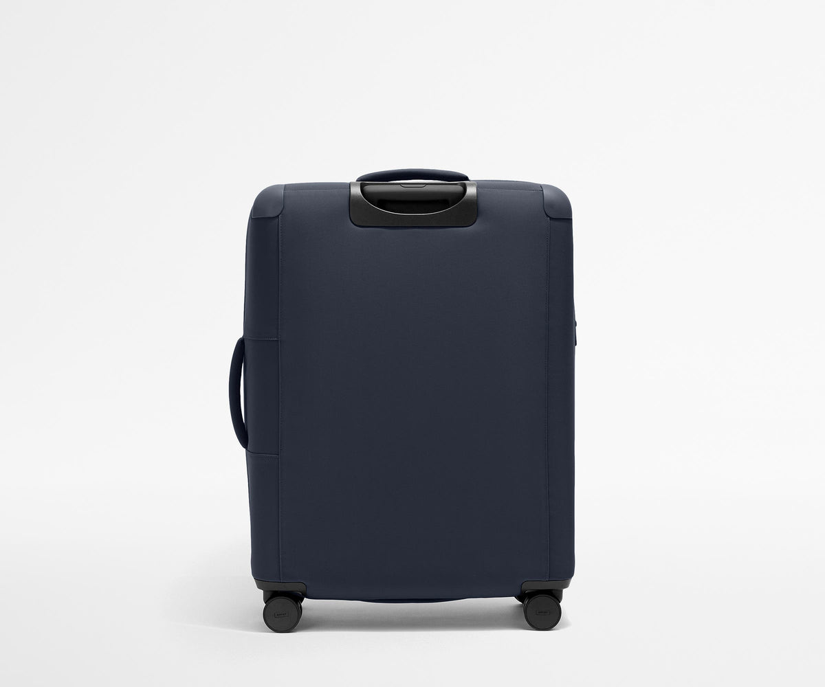 Navy Blue Large Soft Shell Suitcase: Checked Luggage | Away