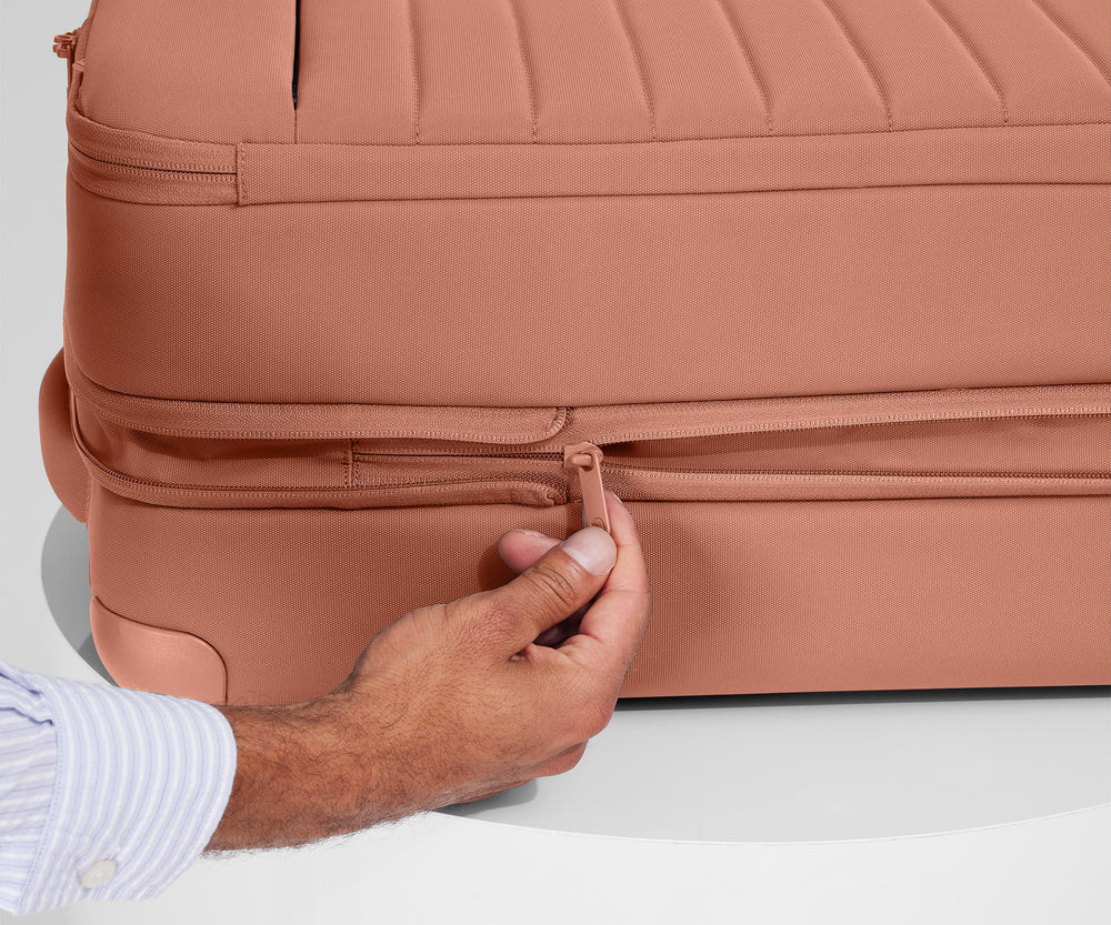 Softside Bigger Carry-On Suitcase in Clay Pink | Away