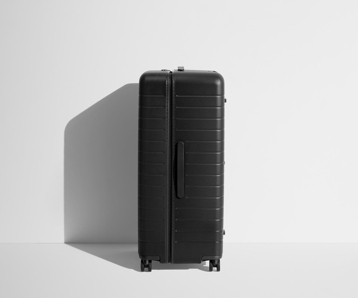 Shop The Trunk suitcase in Jet Black | Away
