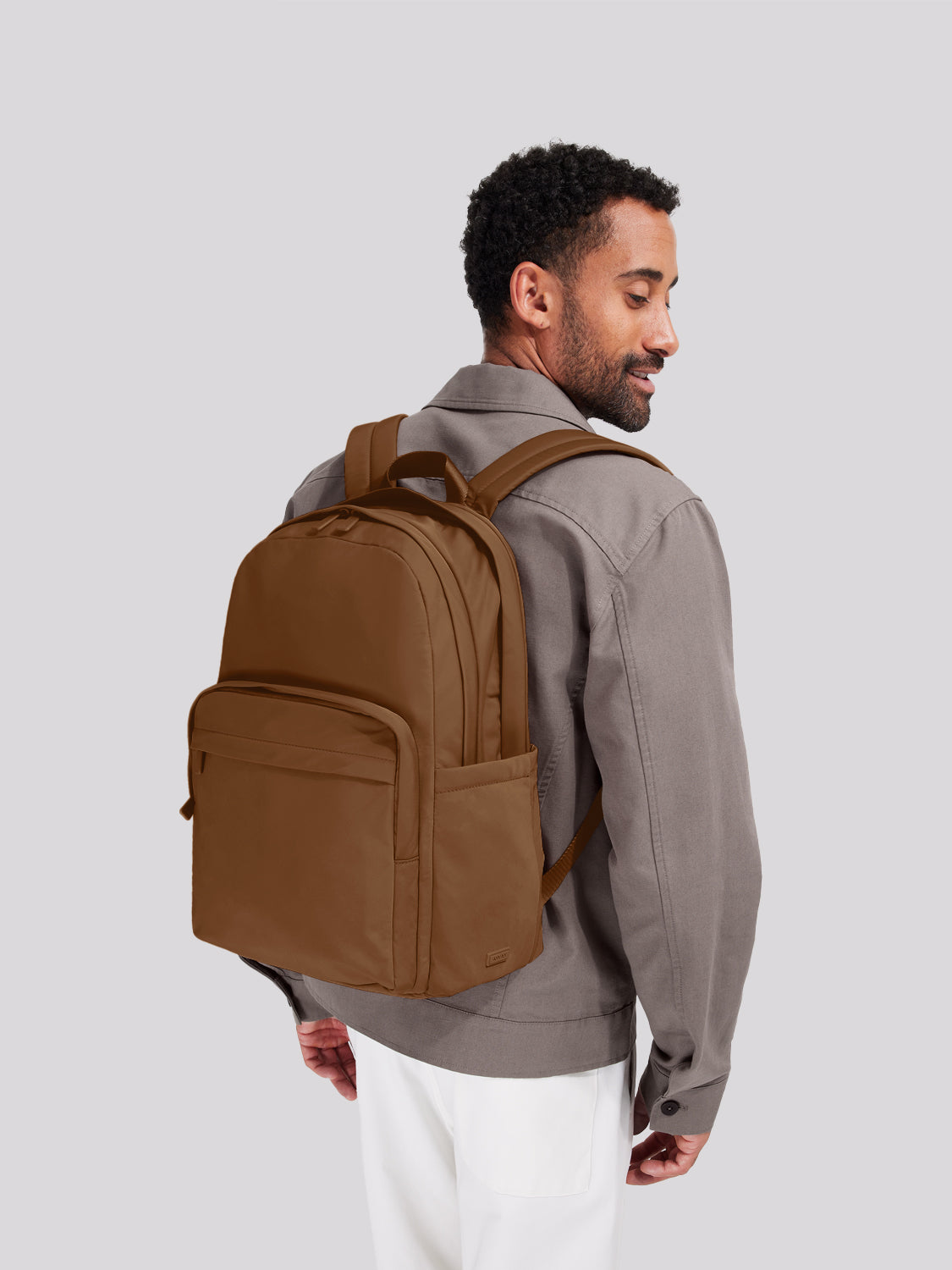 Backpacks with Laptop + Trolley Sleeves | Away: Built for modern travel