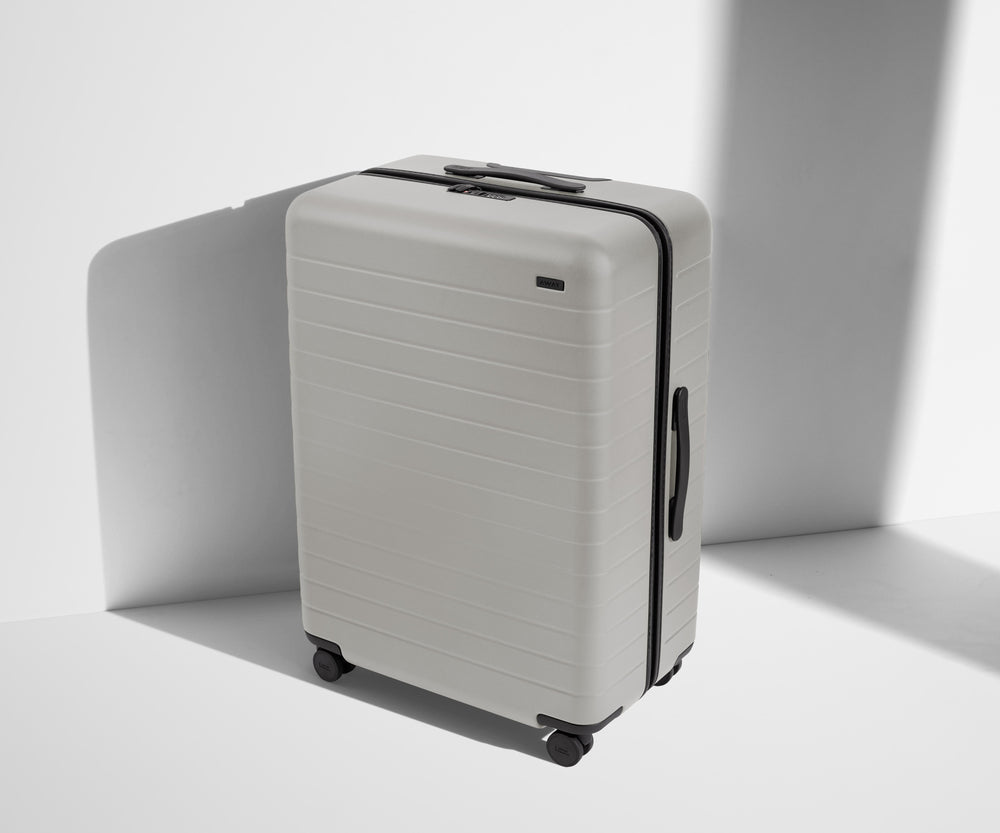 Shop Large & Checked Suitcases in Cloud Gray | Away