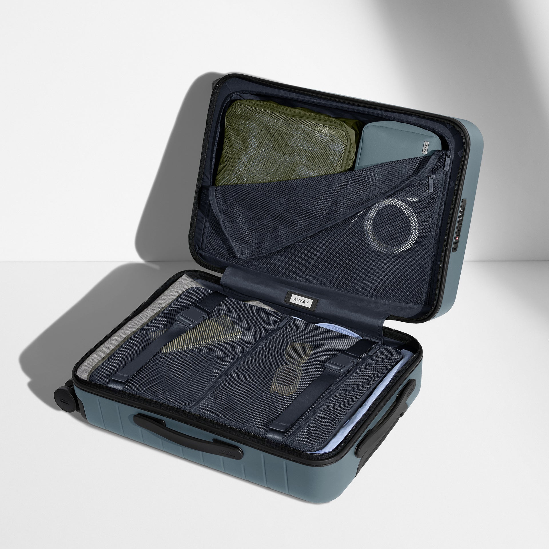 Browse Medium Suitcases in Jet Black | Away