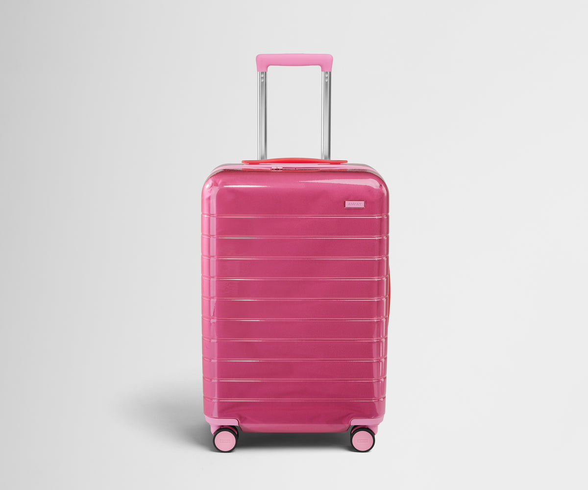 Shop The Bigger Carry-On suitcase in Translucent Pink | Away