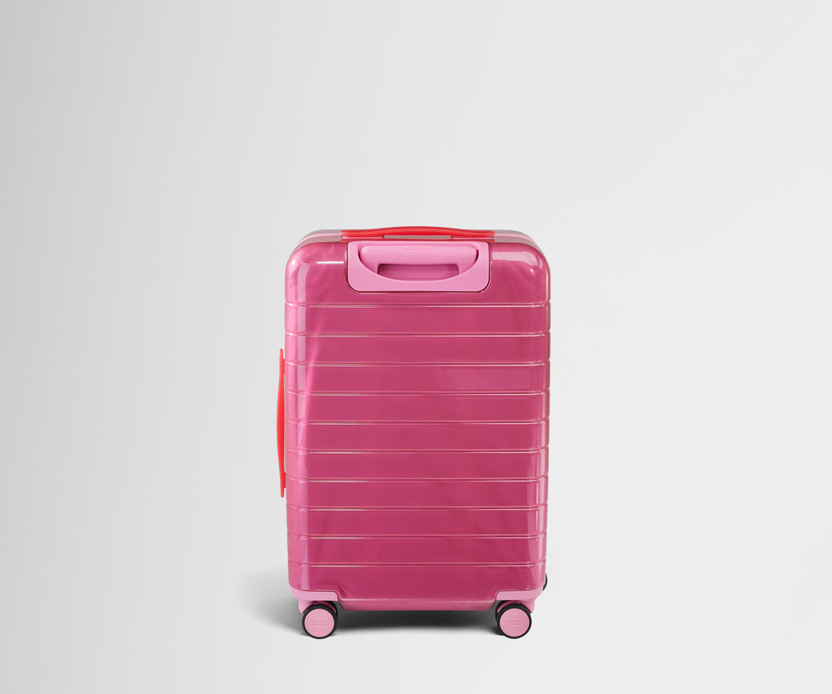 Shop The Bigger Carry-On suitcase in Translucent Pink | Away