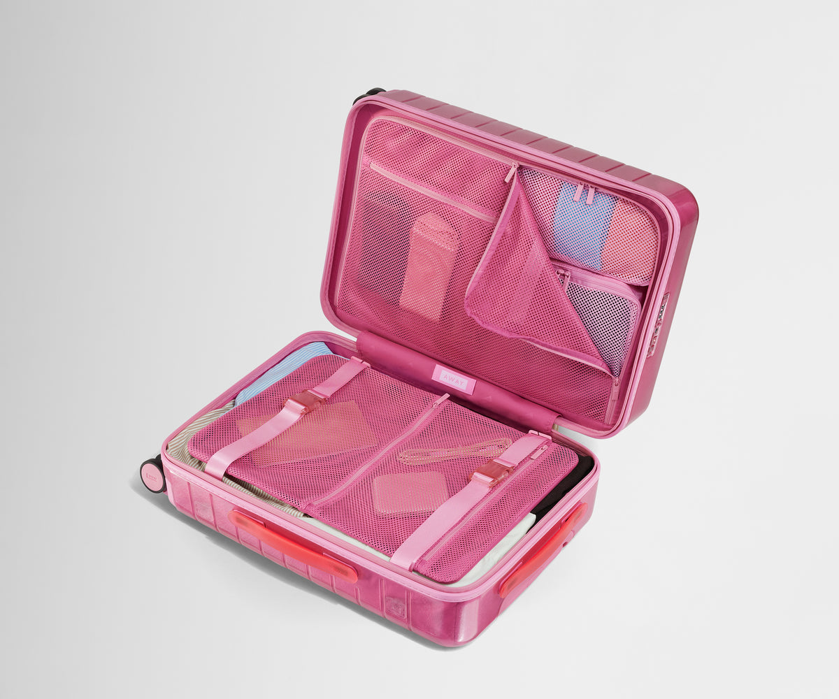 Shop The Bigger Carry-On suitcase in Translucent Pink | Away